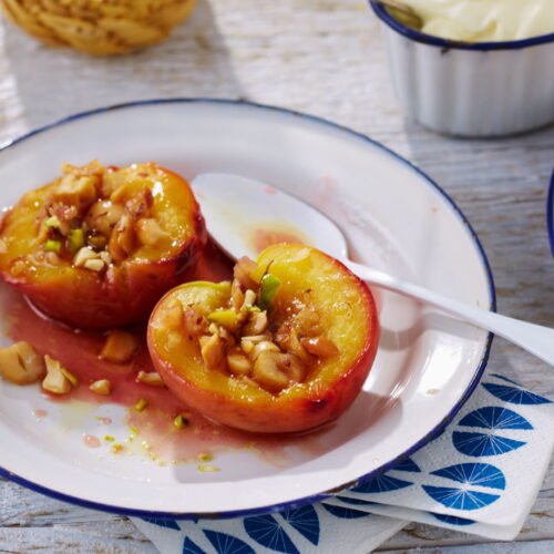 A Southern Twist on Baked Peaches: Salted Nuts for Added Flavor